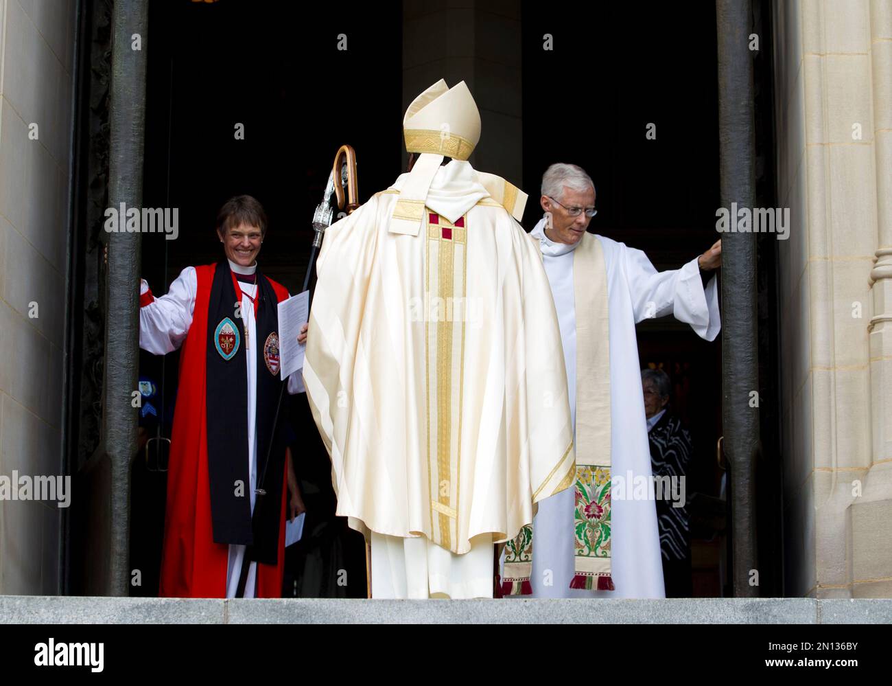 Members of the clergy open the doors to Presiding Bishop-elect Michael ...