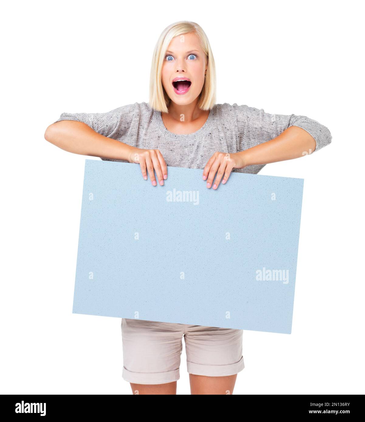 Mockup, shock and surprise on woman with a poster advertising ...