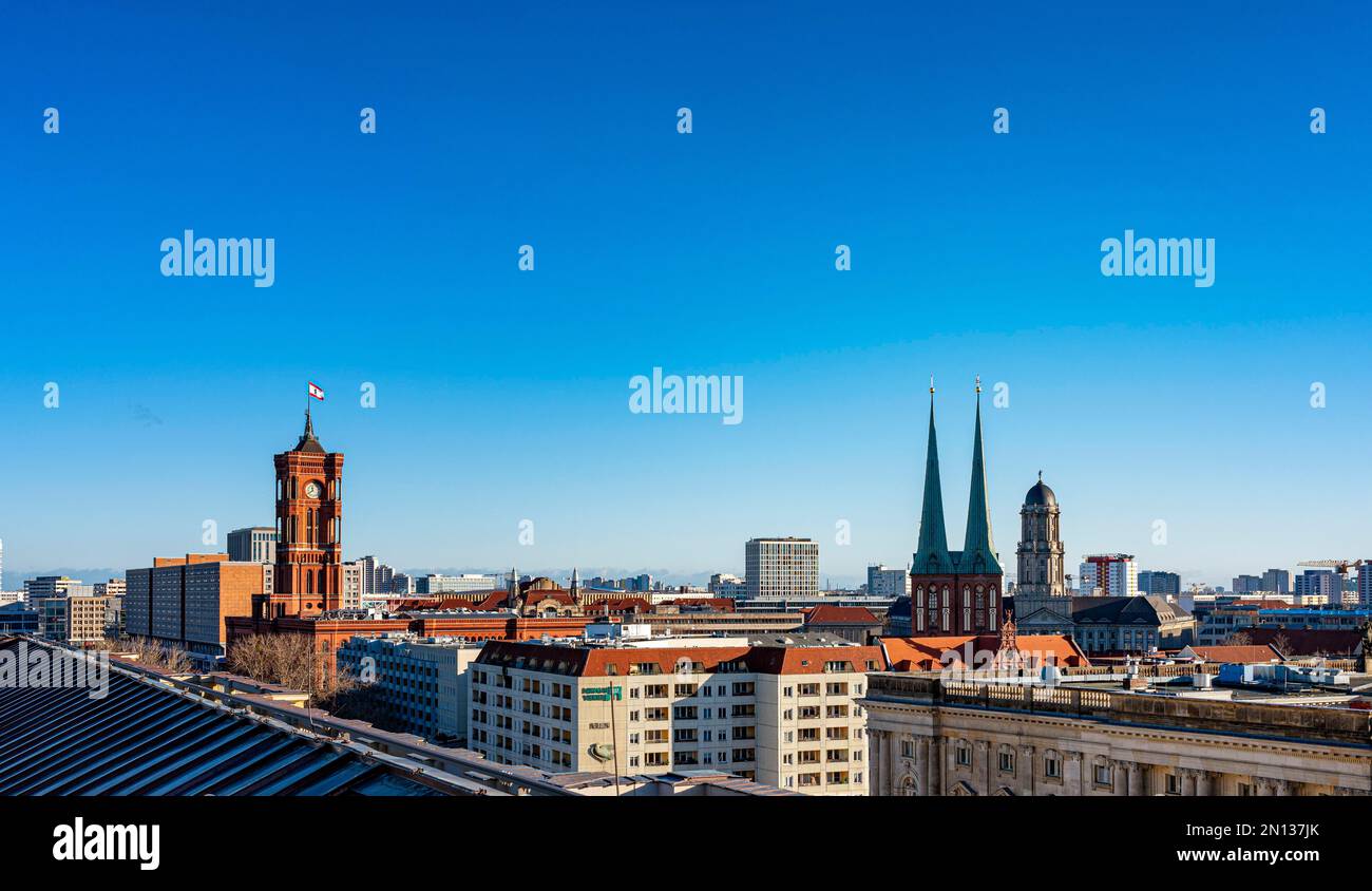 View of the Red City Hall and St. Nicholas Church from the roof terrace ...