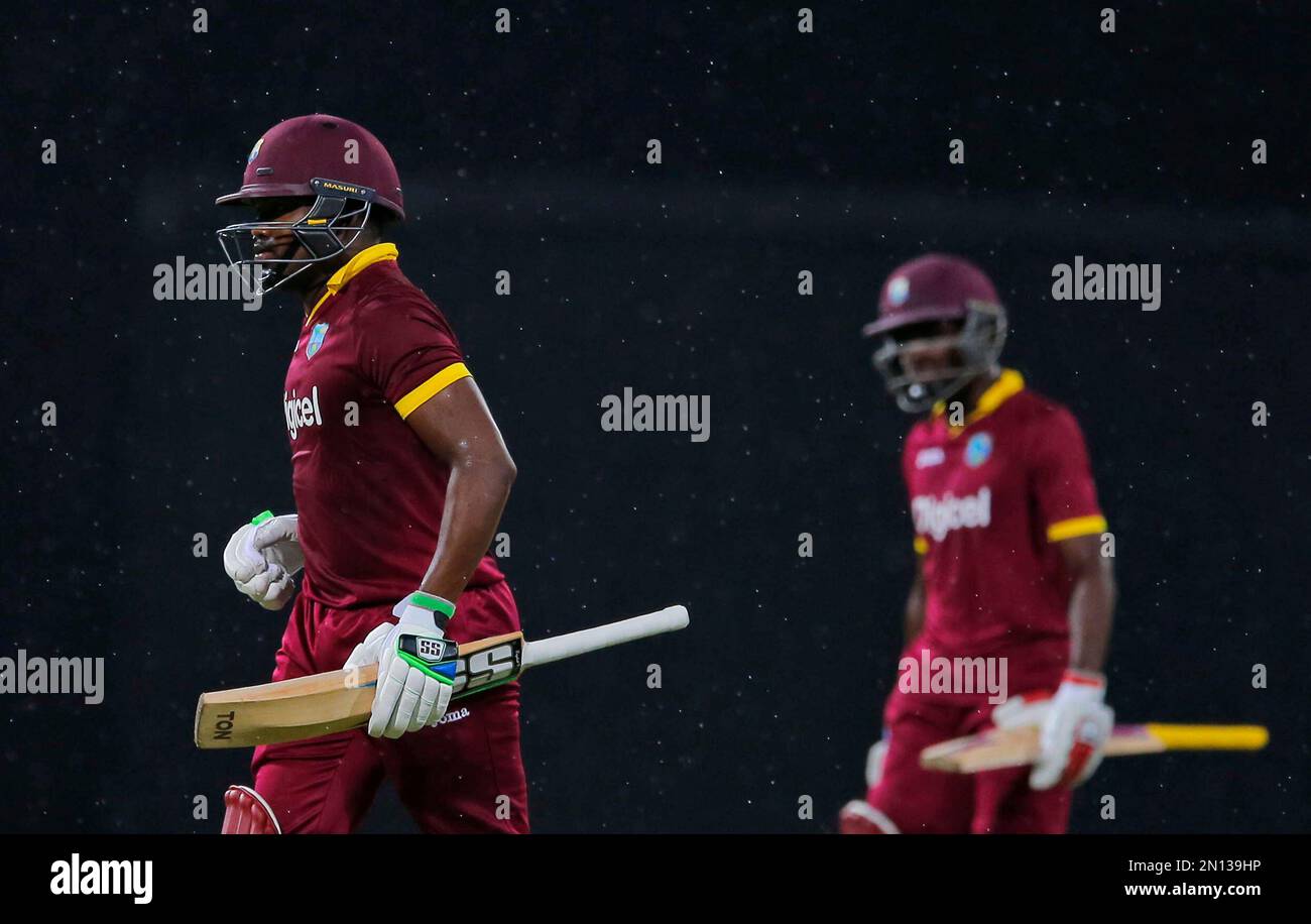 West Indies' Darren Bravo, left, and Jonathan Carter walk out of the ...