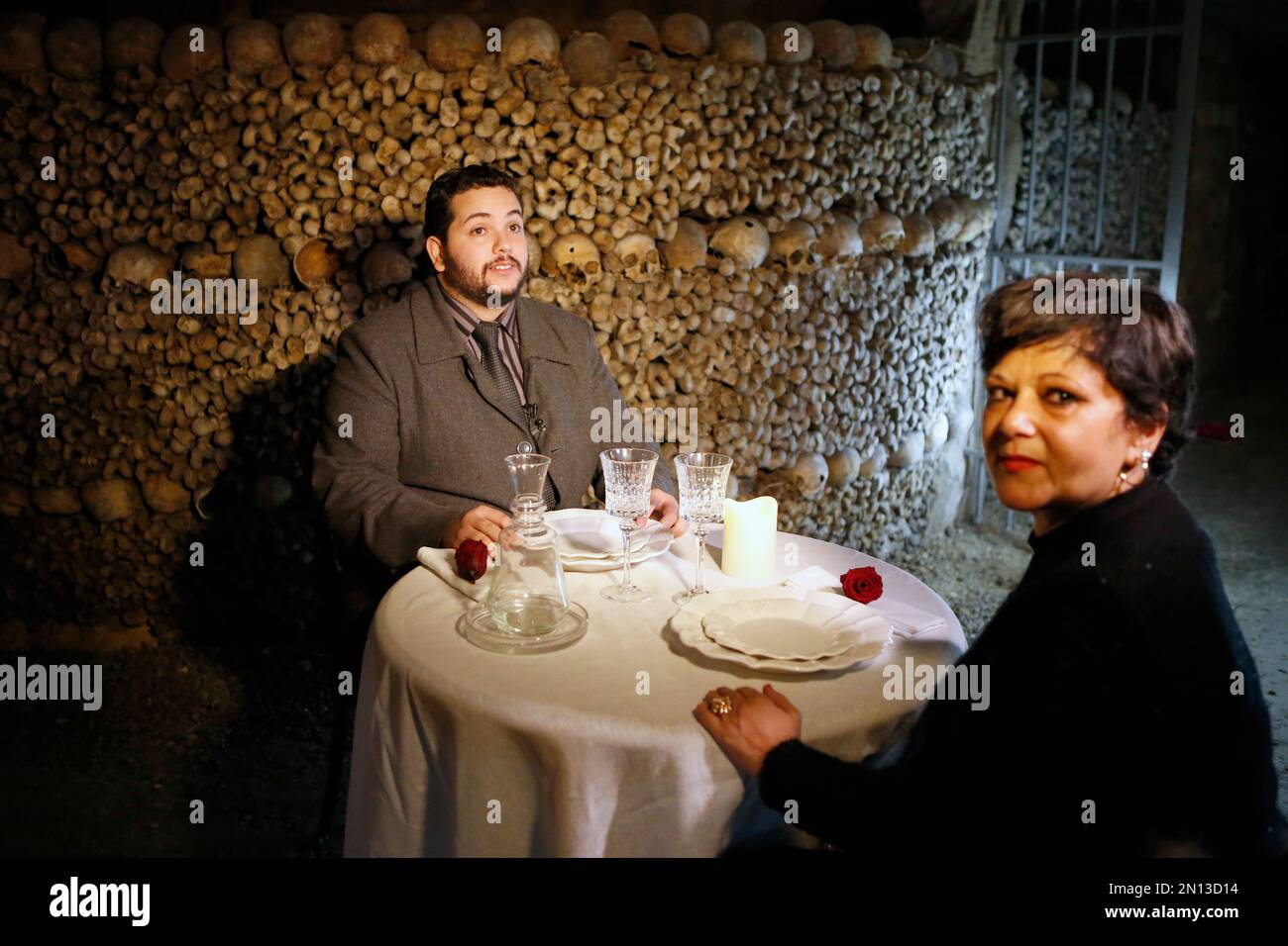 Guests Brazilian Pedro Arruda, 27, left, and his mother Monica, pose as they arrive to spend the ...