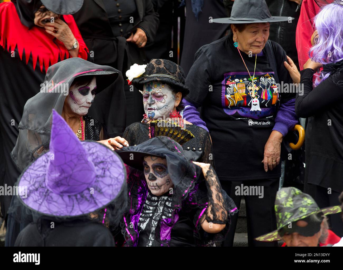 Senior citizens from the social group "Golden Age" wear "calaca ...