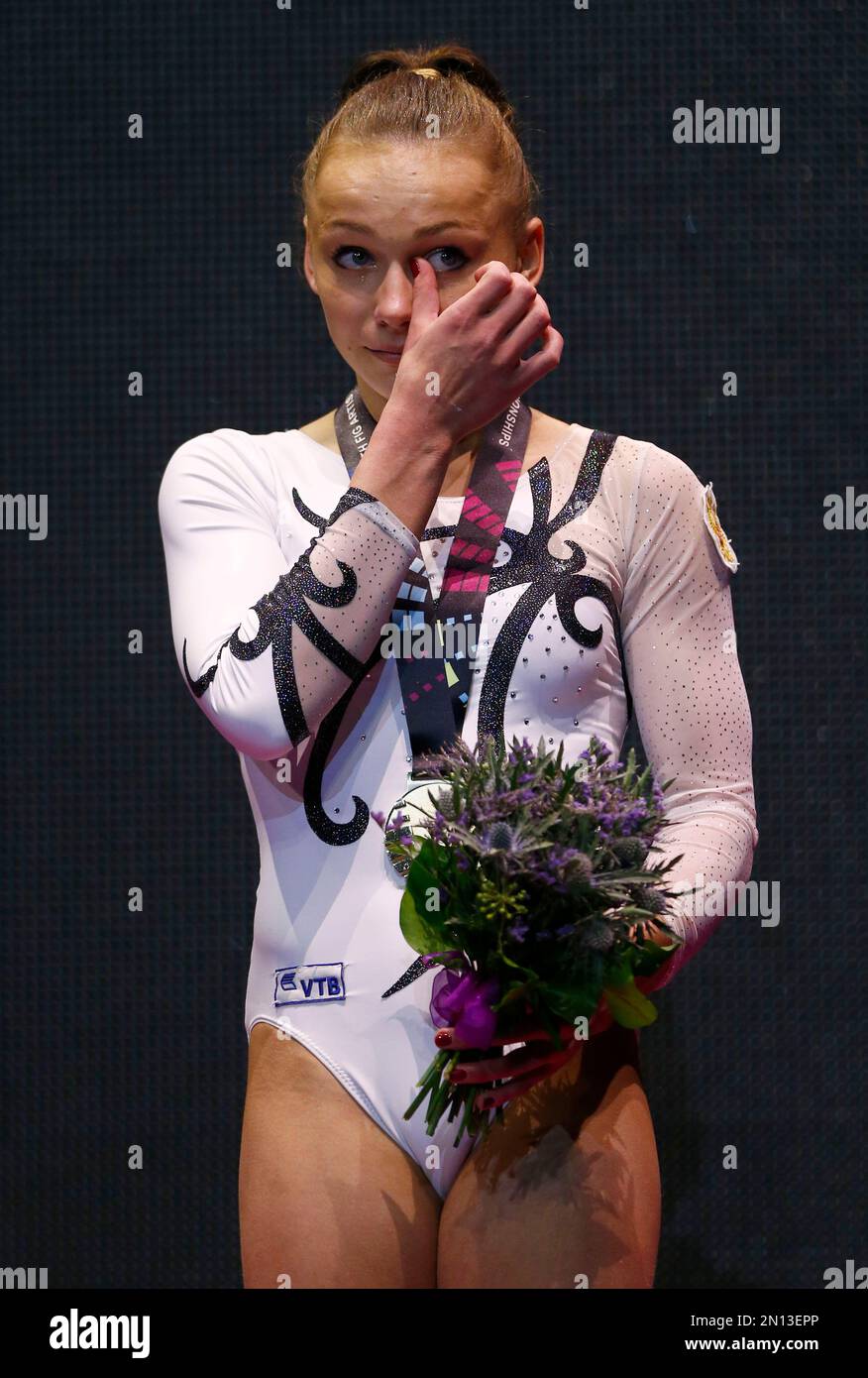 Gold medal winner Russia’s Maria Paseka wipes tears from her eyes on ...