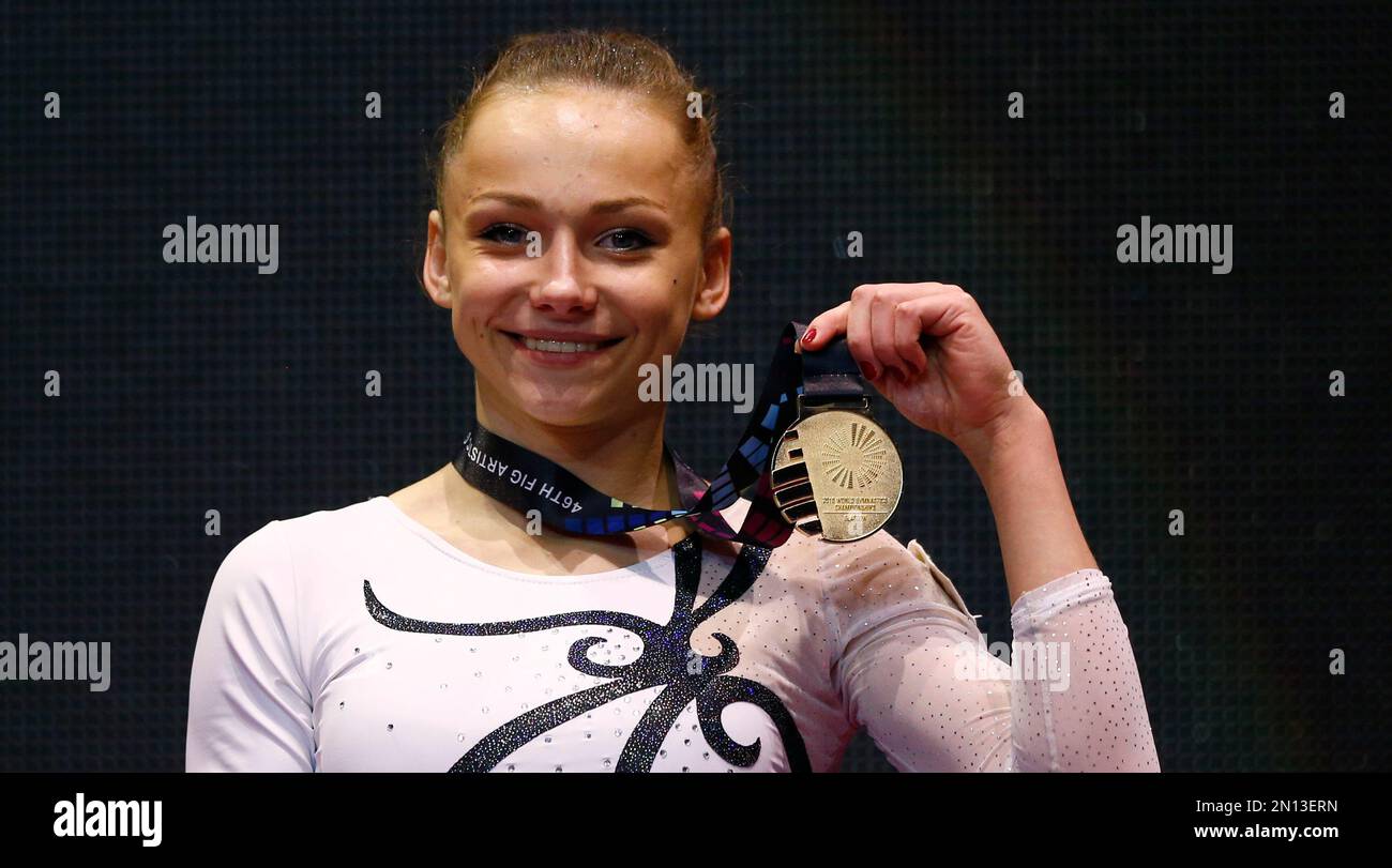 Gold medal winner Russia’s Maria Paseka poses on the podium after the ...