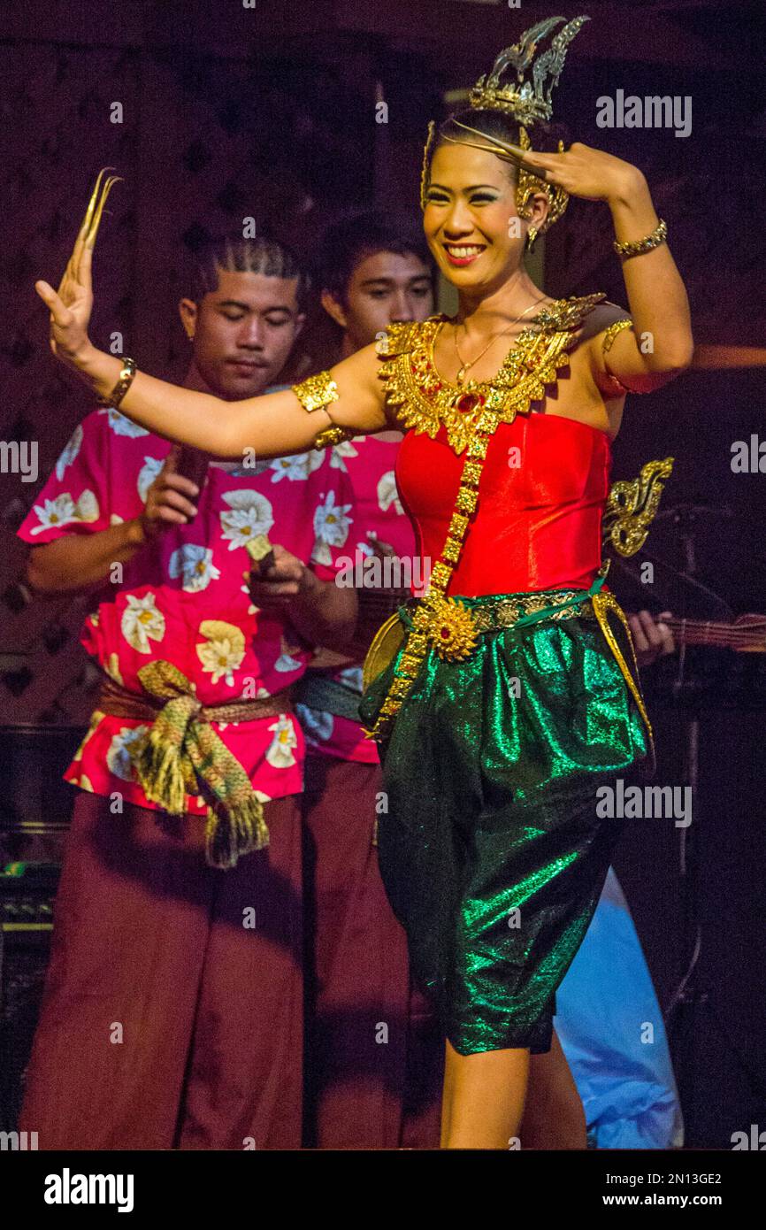 Thai dance performance, Thai girls and men perform a local dance ...