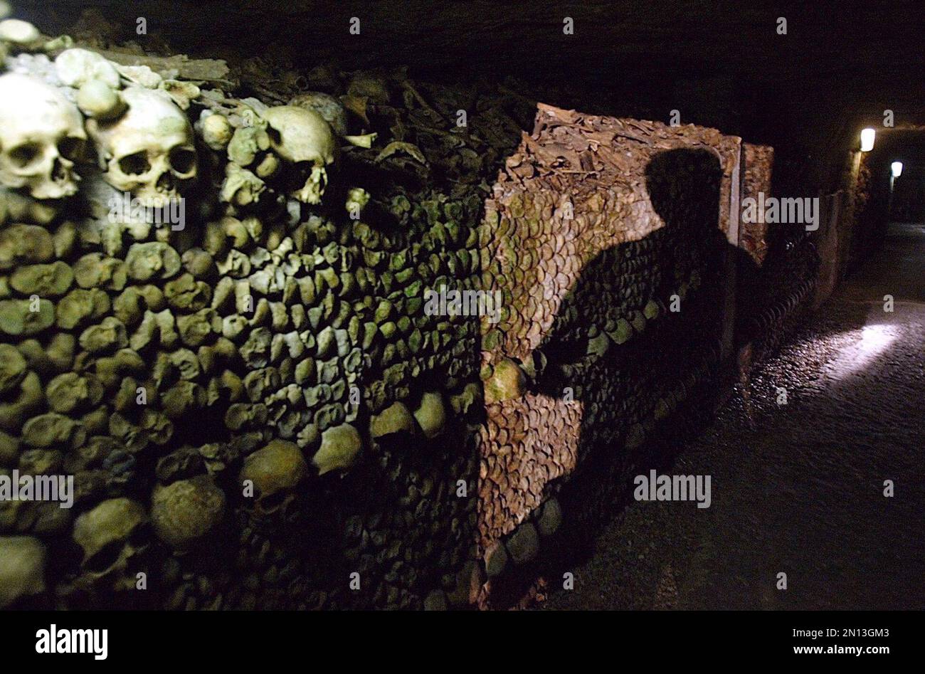 FILE - In this Sept.15, 2004 file photo, a man is shadowed in the ...