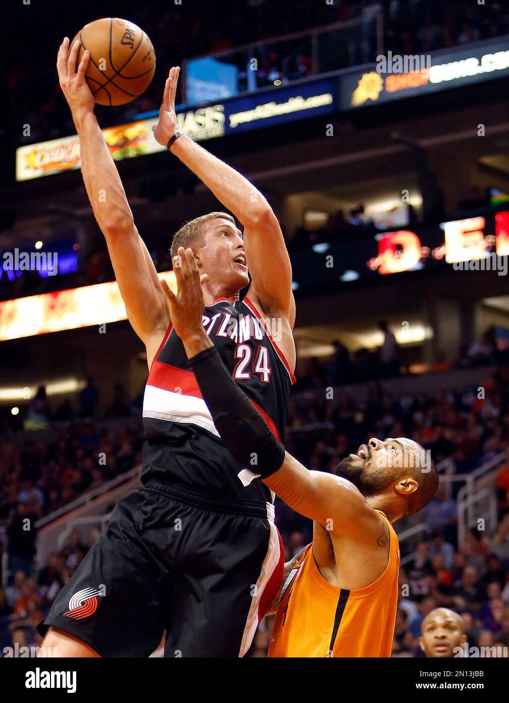 Portland Trail Blazers forward Mason Plumlee (24) shoots over Phoenix ...
