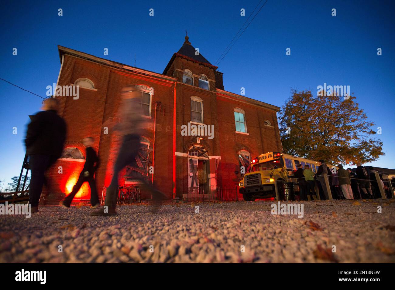 Guests arrive at the The Dent Schoolhouse haunted attraction, Thursday ...