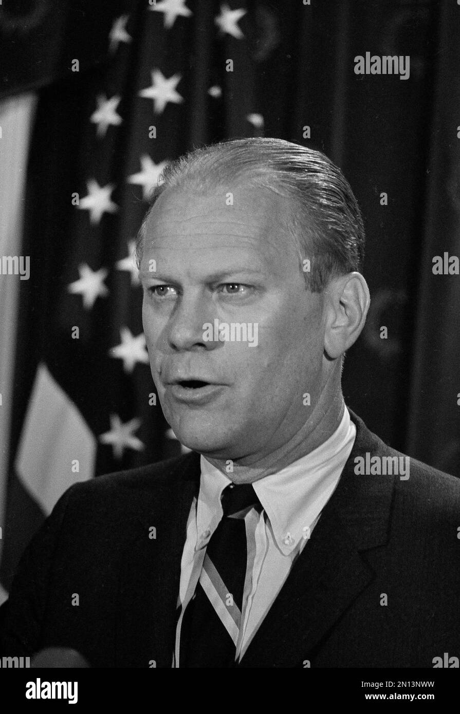 House Republican Leader Gerald Ford of Michigan talks to reporters at ...