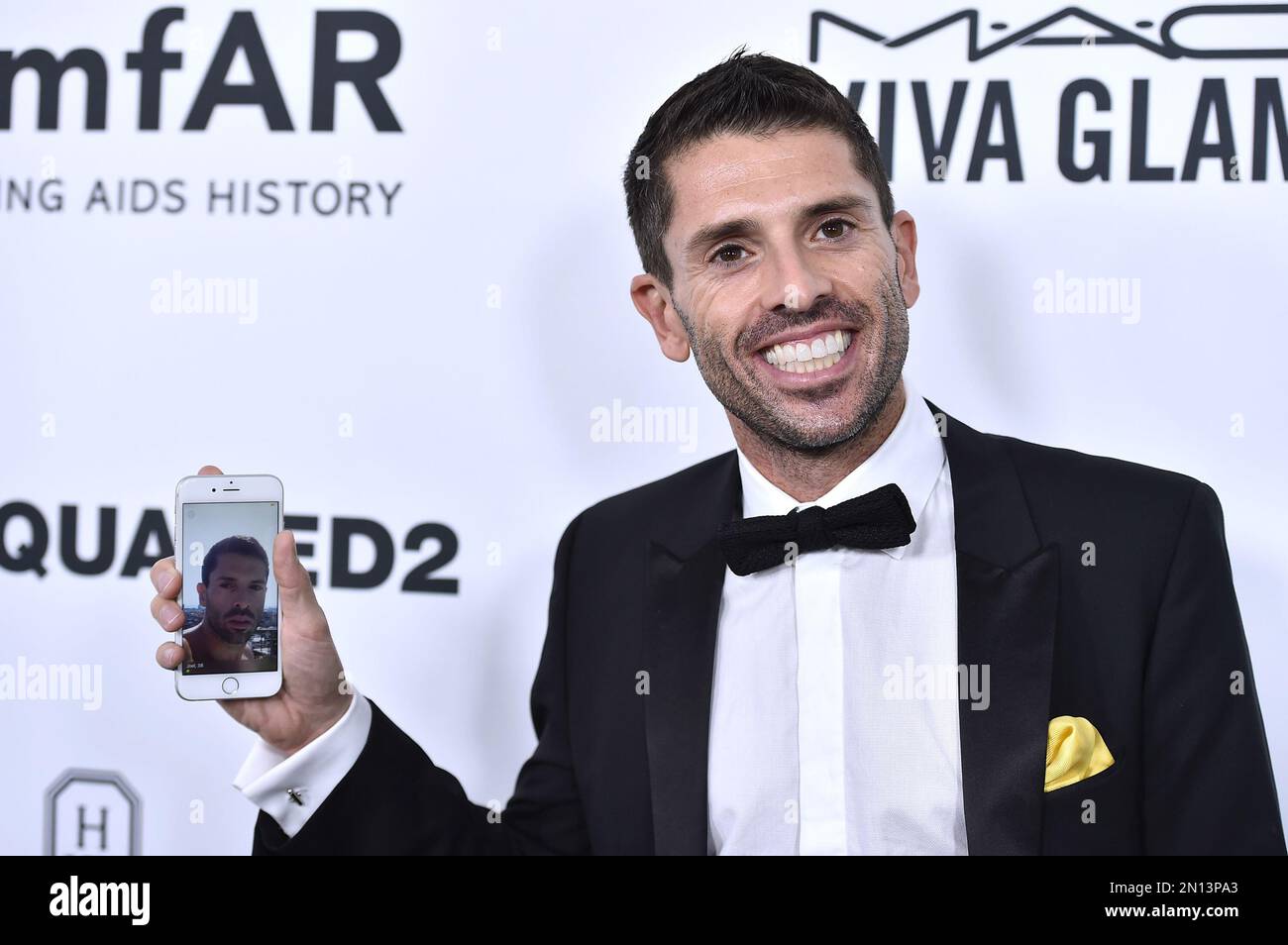 Joel Simkhai, founder and CEO of Grindr arrives at the amfAR ...