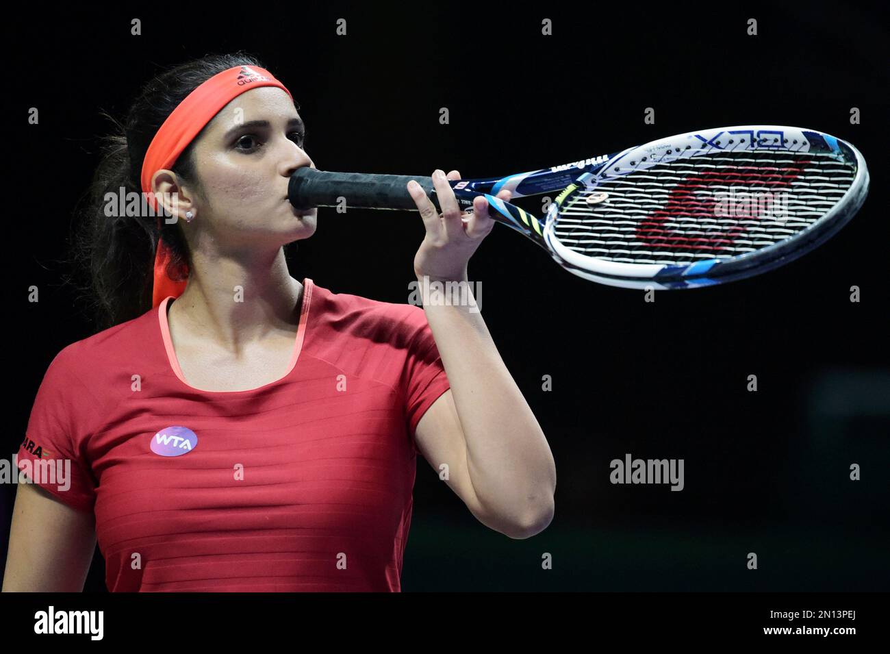 Sania Mirza of India reacts as she and partner Martina Hingis of ...