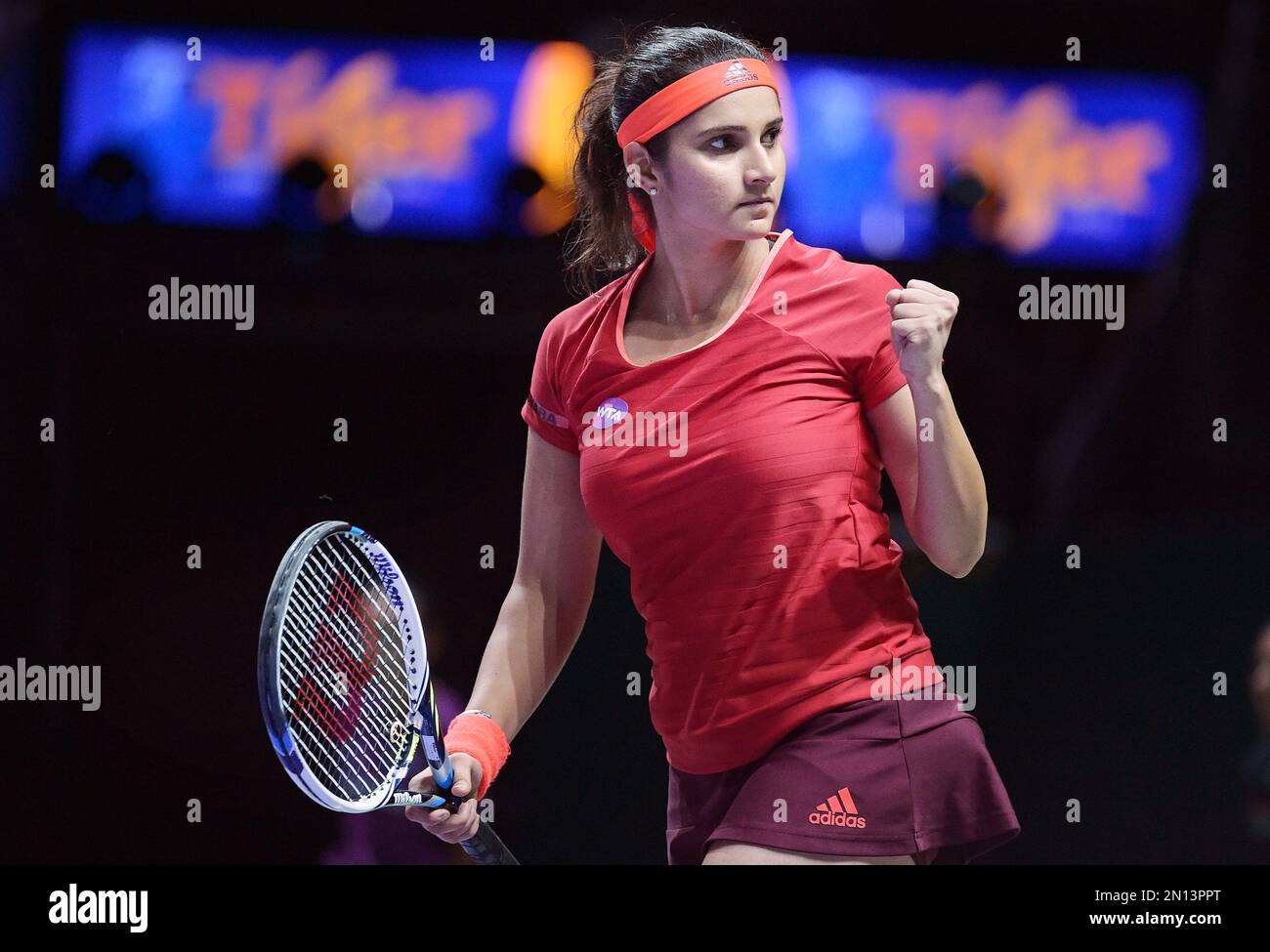 Sania Mirza of India celebrates winning a set with her partner Martina ...