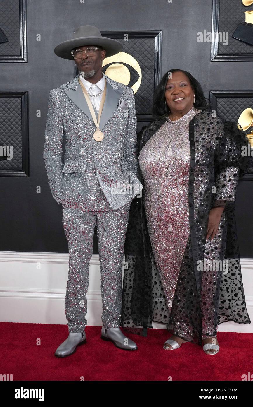 Ricky Dillard, left, and Wendy Long arrive at the 65th annual Grammy ...