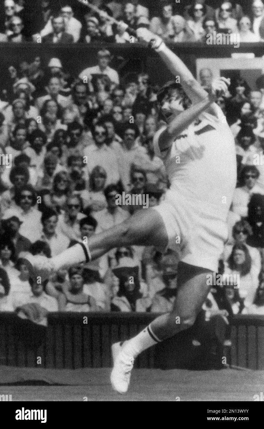 Jimmy Connors leaps leaps high into the air to slam a return to fellow ...