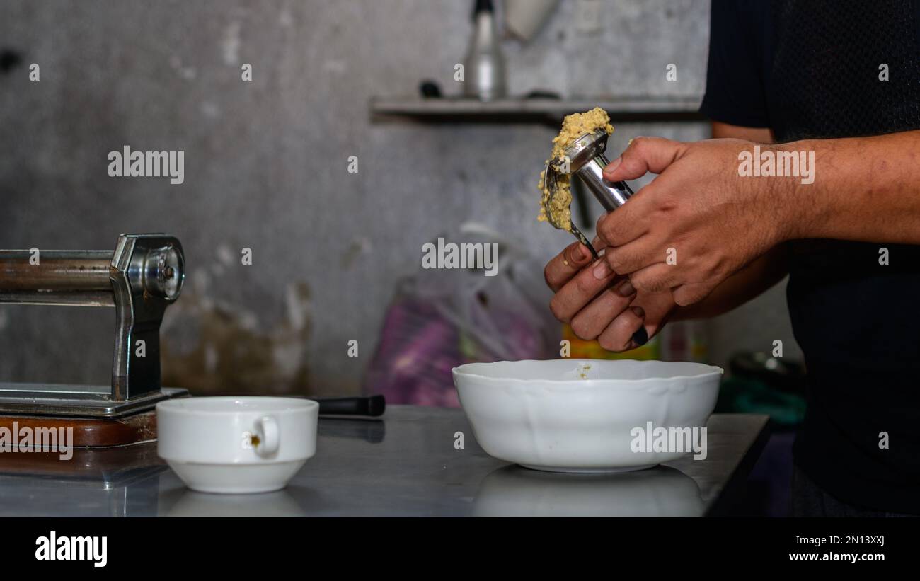 Making falafel balls in the kitchen Stock Photo - Alamy