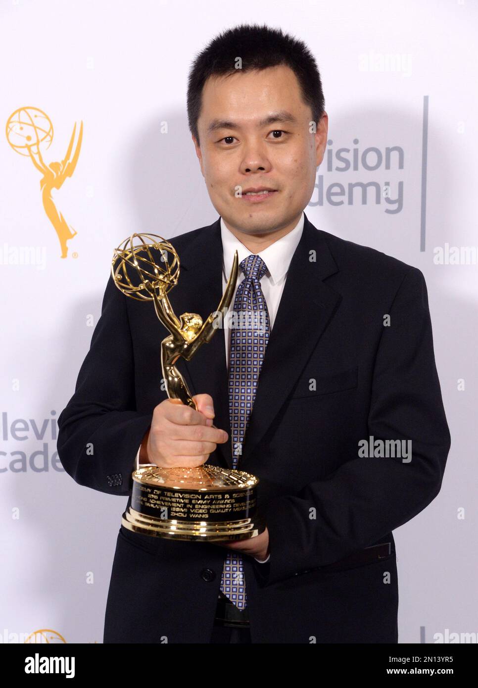 Zhou Wang poses for a portrait with the Engineering Emmy for structural ...