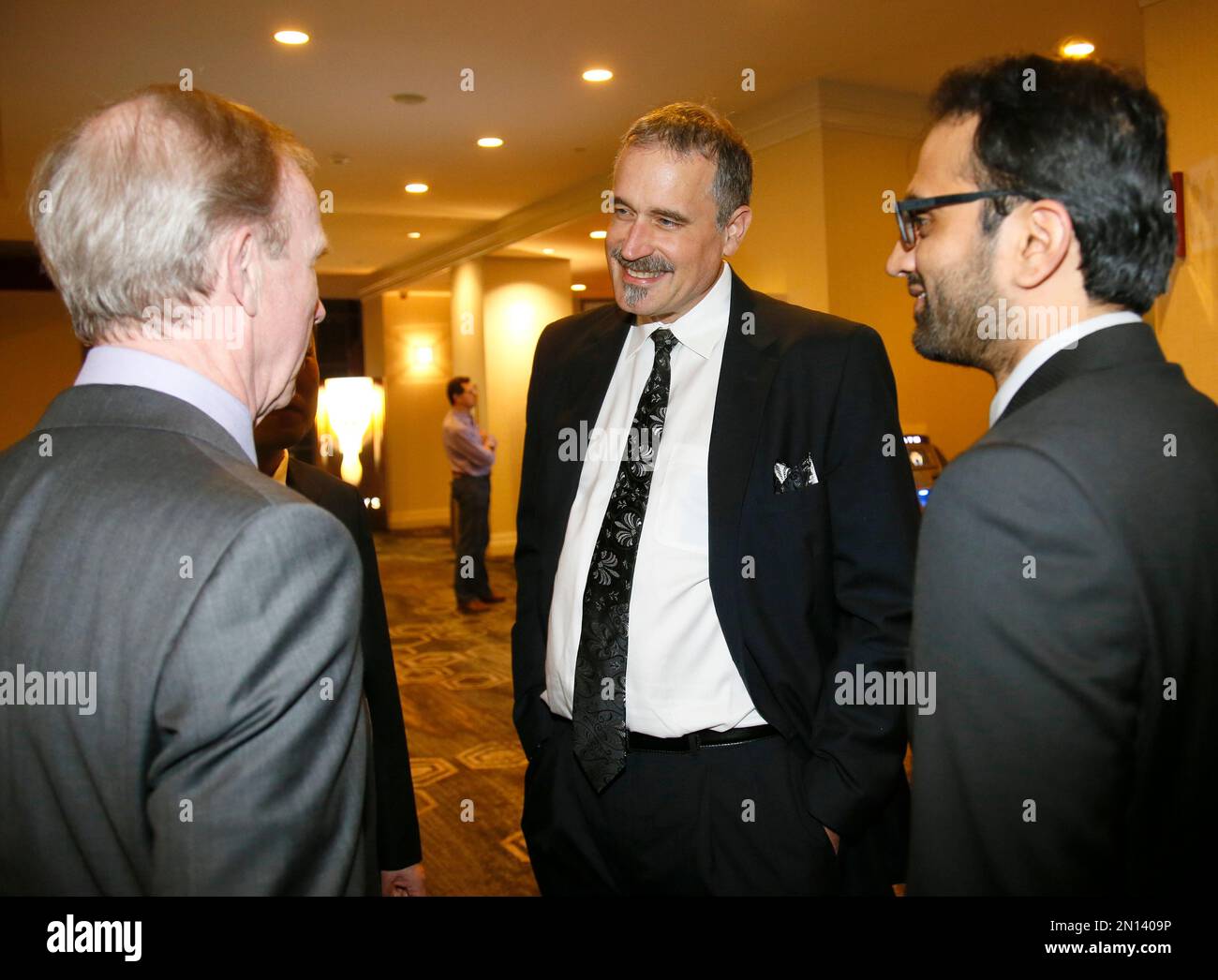 Richard Cook, from left, Alan Bovik and Abdul Rehman attend the 67th ...