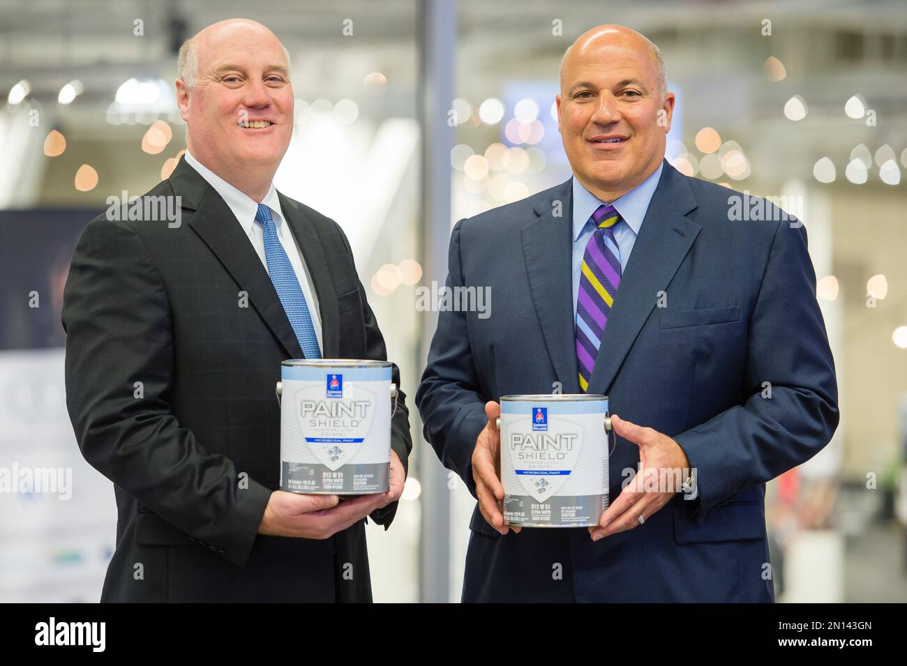 Sherwin-Williams executives, Steve Revnew, Sr. VP of Product Innovation left, and John Morikis ...