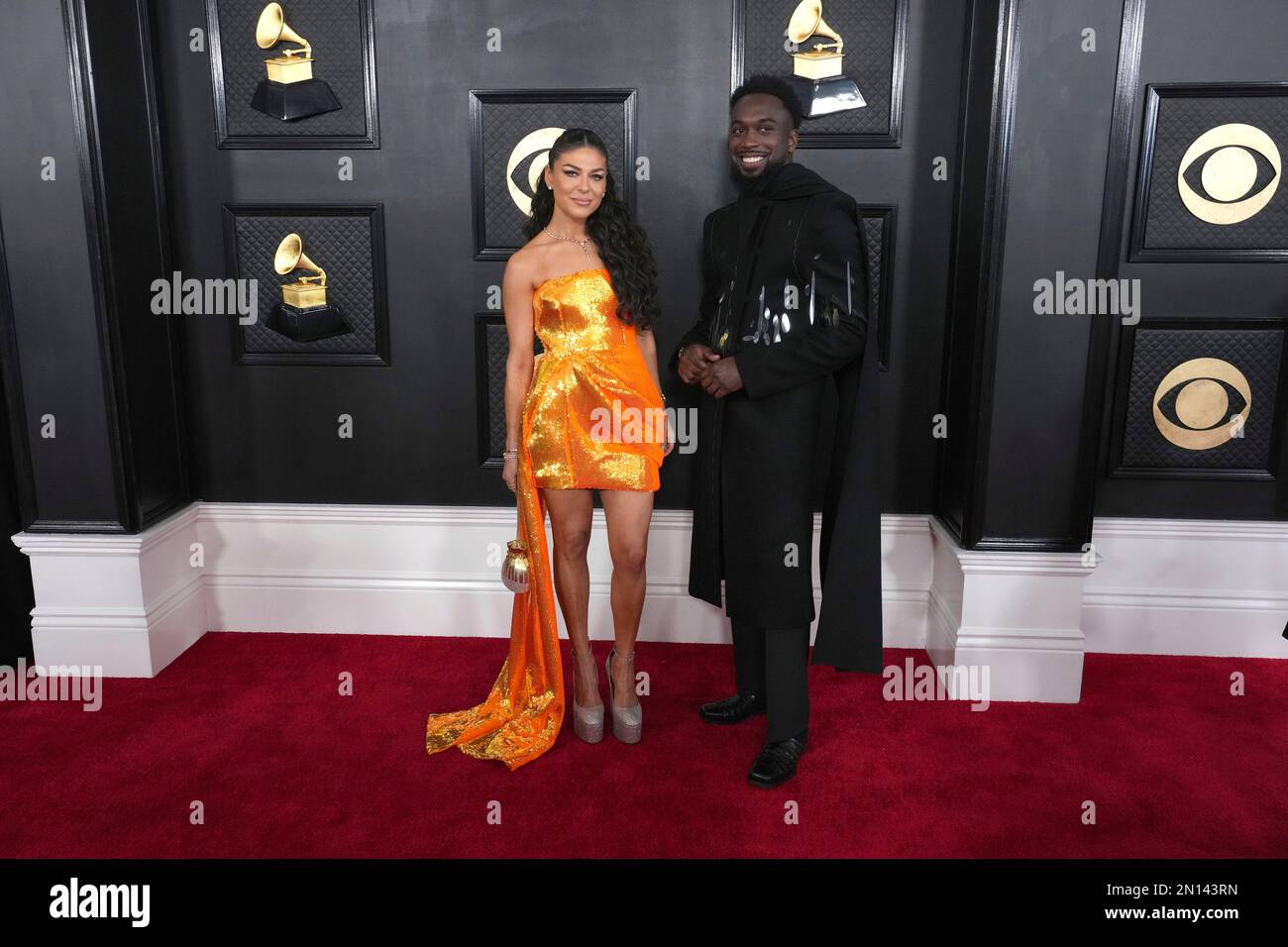 Sabrina Harrison, left, and Dante Bowe arrive at the 65th annual Grammy ...