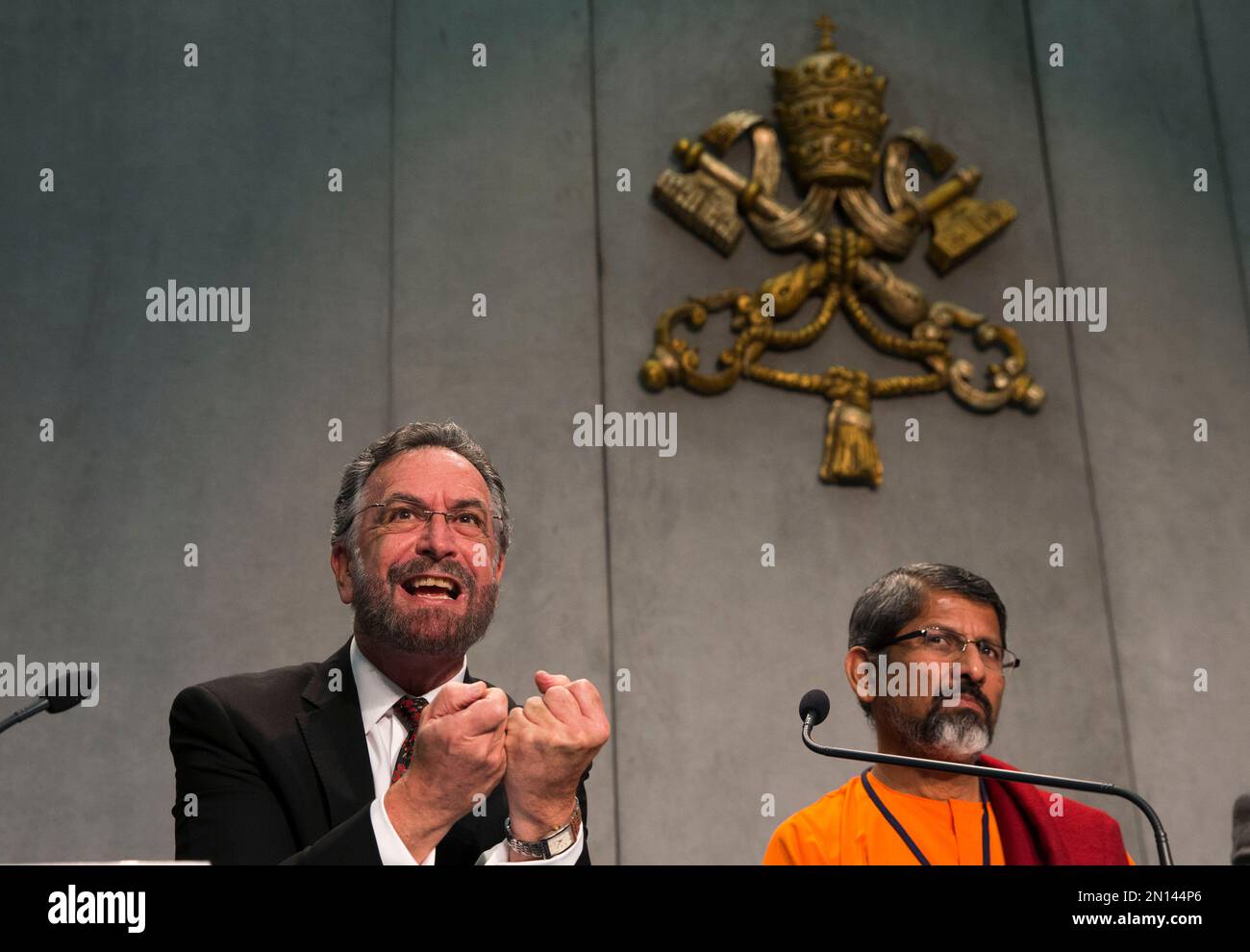 Rabbi David Rosen, left, flanked by Swami Chidananda Saraswati, talks ...
