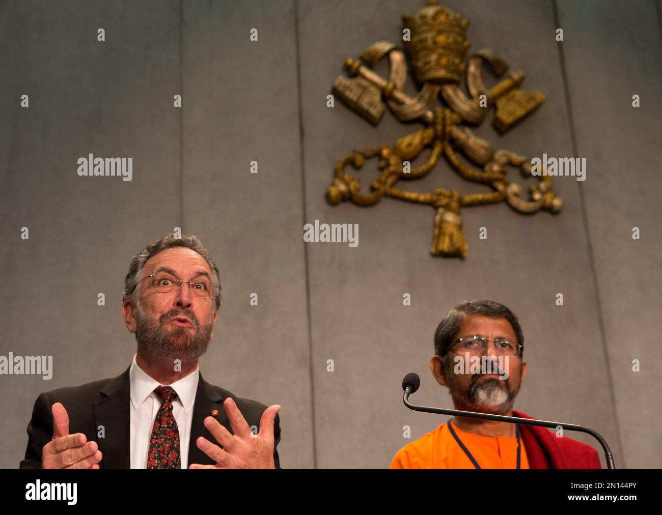 Rabbi David Rosen, left, flanked by Swami Chidananda Saraswati, talks ...