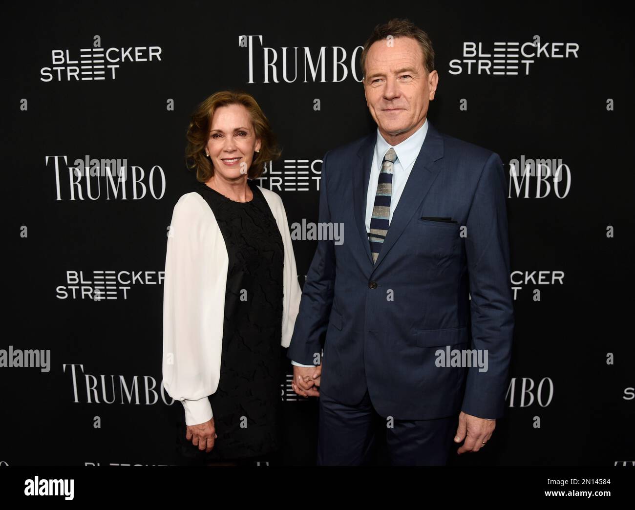 Bryan Cranston, star of "Trumbo," arrives with his wife Robin at the ...
