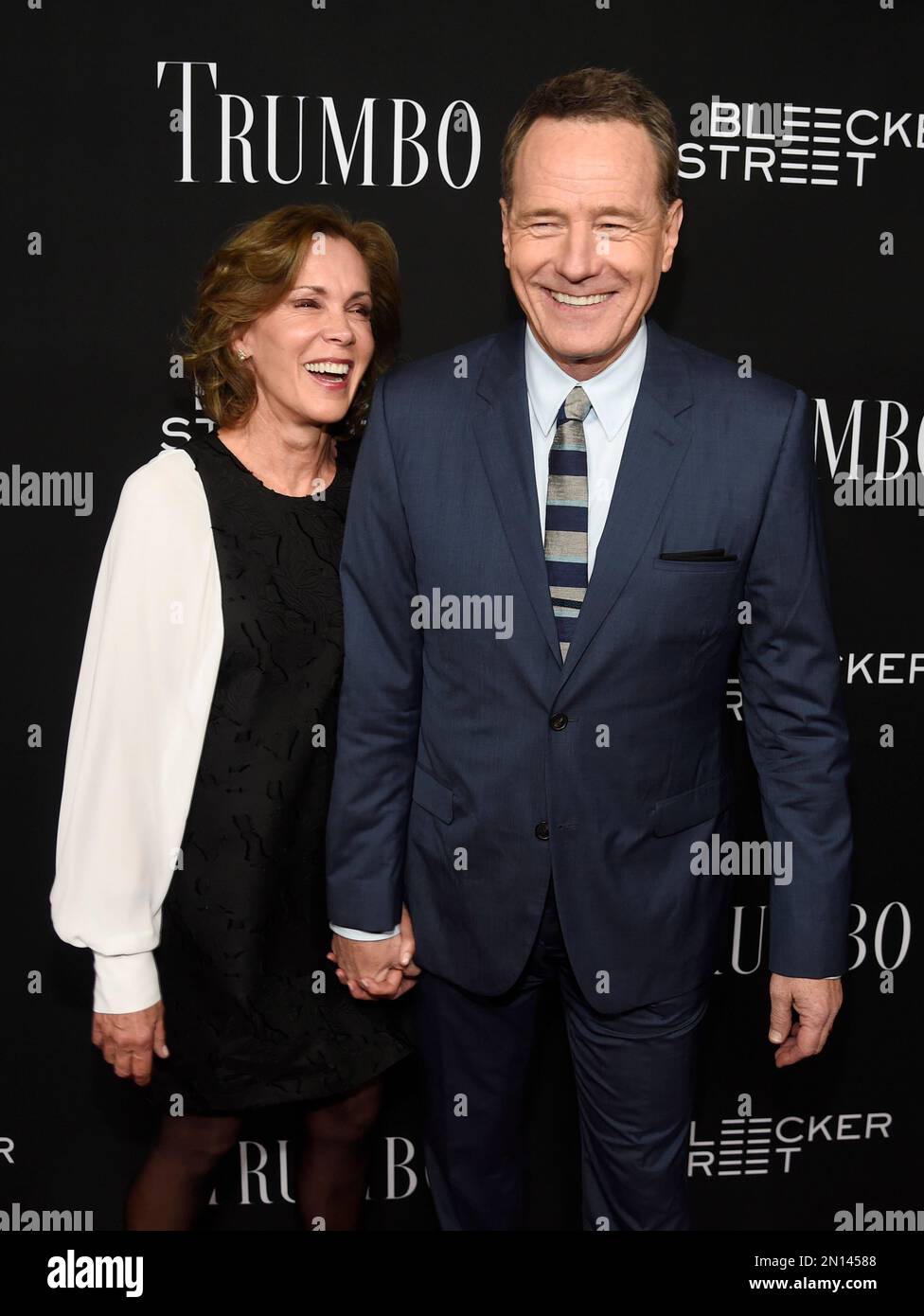 Bryan Cranston, star of "Trumbo," arrives with his wife Robin at the ...