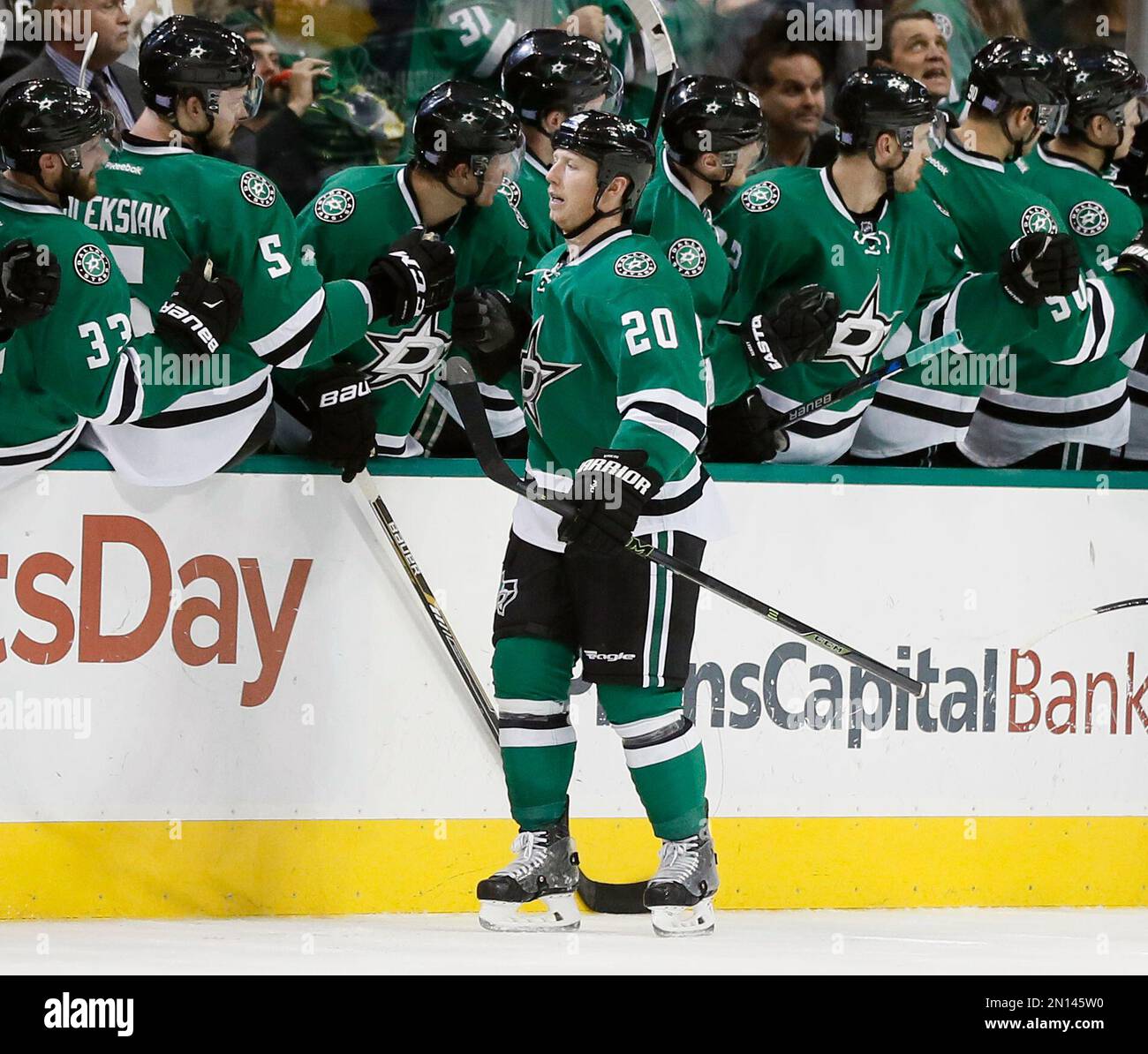 Dallas Stars' Cody Eakin (20) is congratulated by the bench after his ...