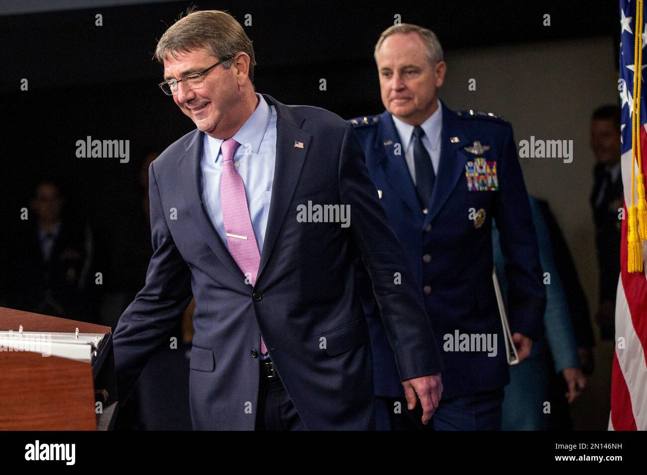 Secretary of Defense Ash Carter, accompanied by Air Force Chief of Staff Gen. Mark Welsh III ...