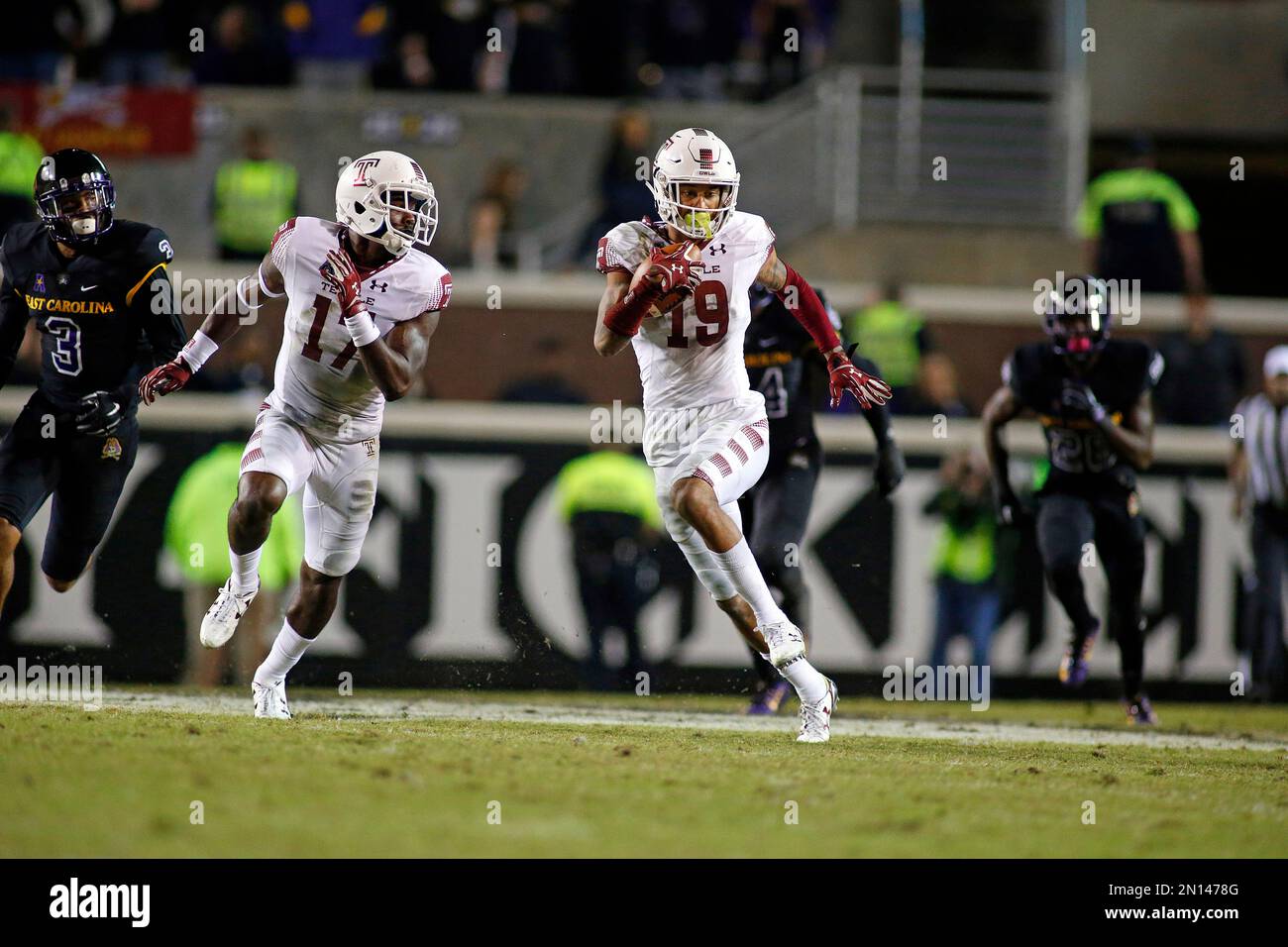 Temple's Robby Anderson (19) hauls in a pass with teammate Brandon ...