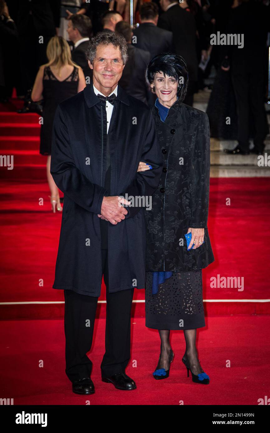 Dennis Gassner and guest pose for photographers upon arrival at the ...