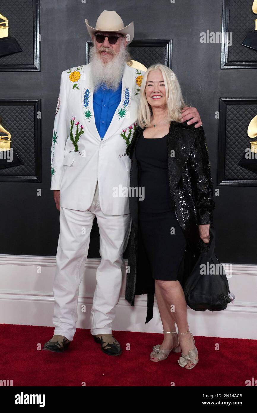 Ray Benson, left, and Marsha Milam arrive at the 65th annual Grammy ...