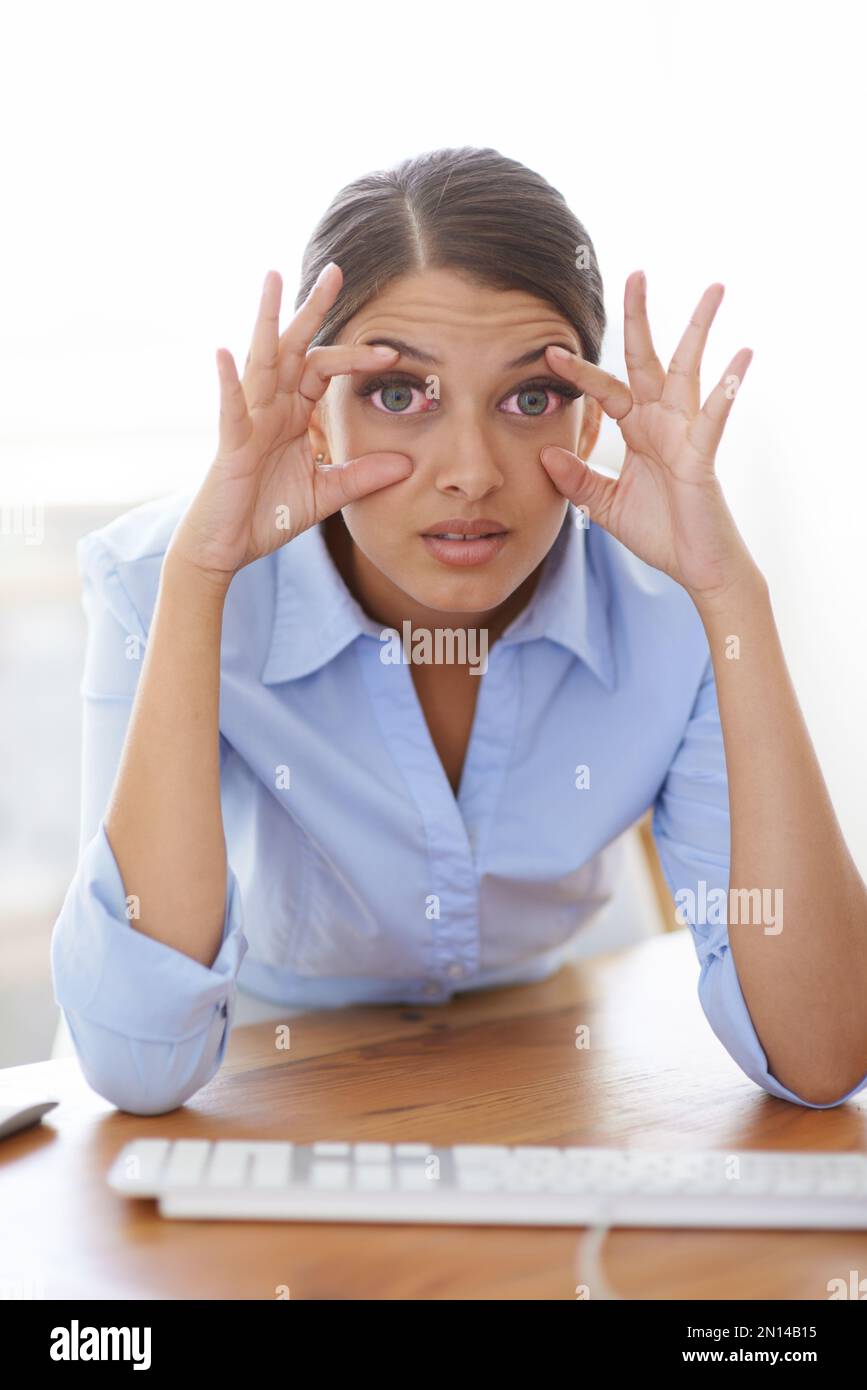 Ive Been Awake Like Forever Can You Tell A Young Businesswoman At Her Desk Trying To Keep Her