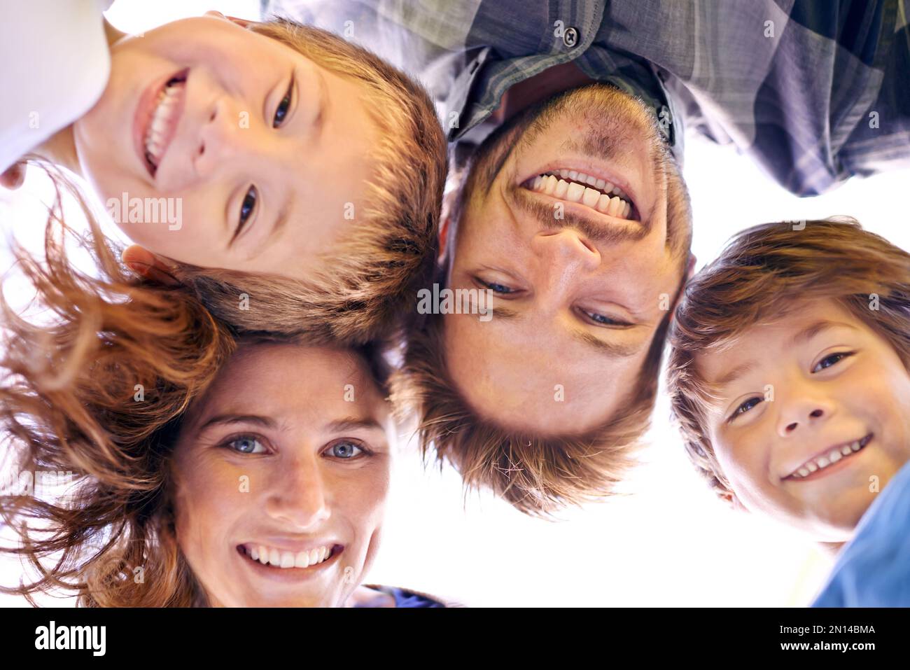 Our family sticks together. Low angle view of a loving family in the ...