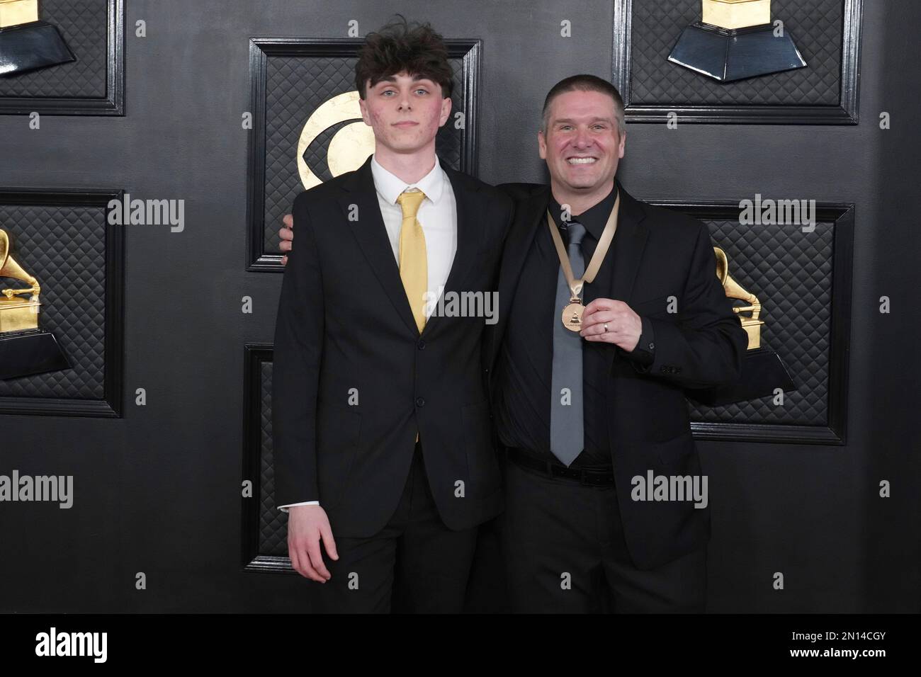 Zach Ayan, left, and Adam Ayan arrive at the 65th annual Grammy Awards ...