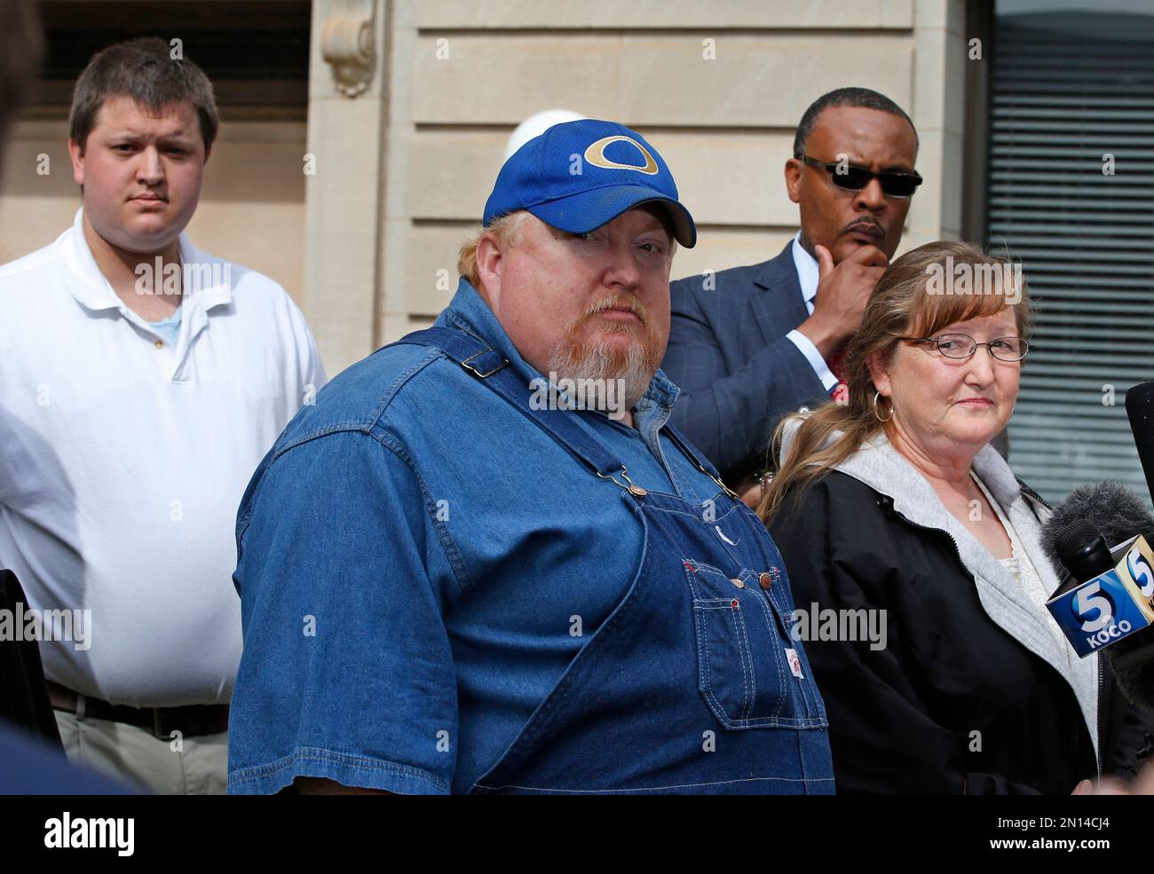 Floyd Chambers, second from left, the father of Adacia Chambers, talks ...