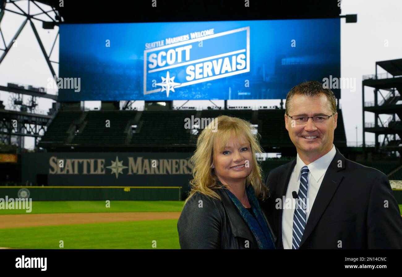 New Seattle Mariners manager Scott Servais poses for a photo with his ...