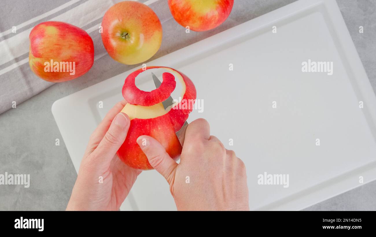Woman peeling an apple hi-res stock photography and images - Alamy