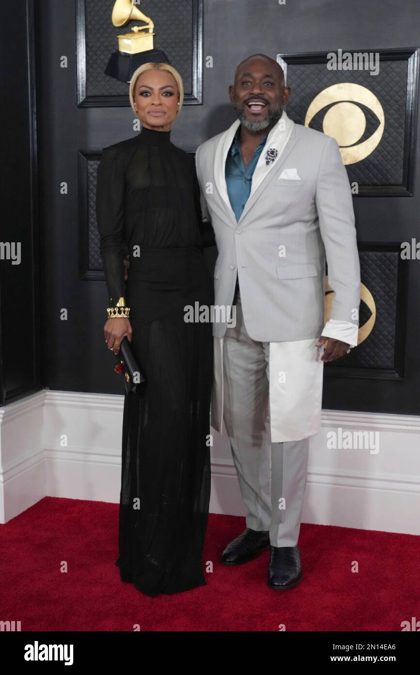 Lauren Stoute, left, and Steve Stoute arrive at the 65th annual Grammy ...