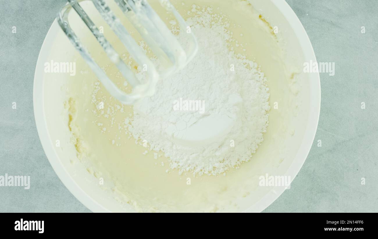 Cream cheese whipped cream recipe. Mixing cream cheese, sugar powder ...