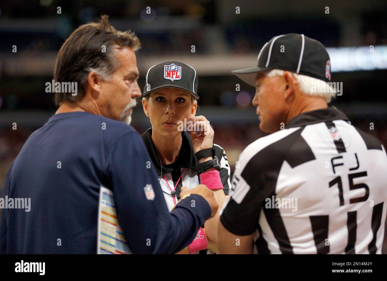 Line judge Sarah Thomas, center, talks with field judge Rick Patterson ...