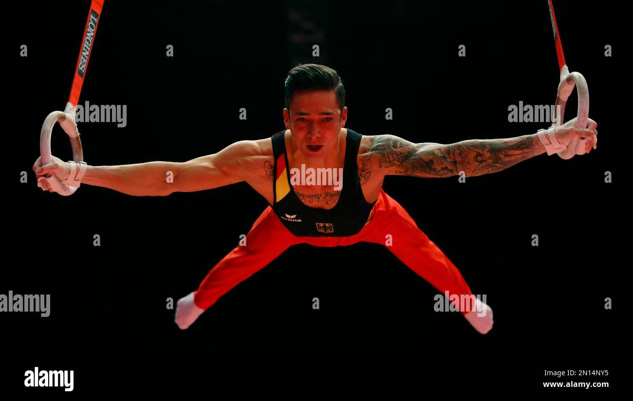 Germany's Marcel Nguyen performs in the rings as he takes part in the ...