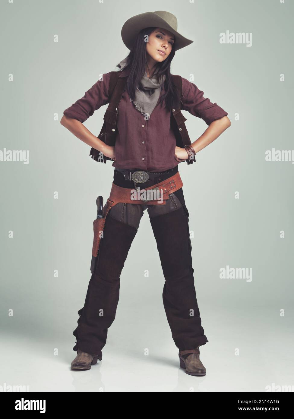 Im the sheriff around these parts...Full-length shot of an attractive ...