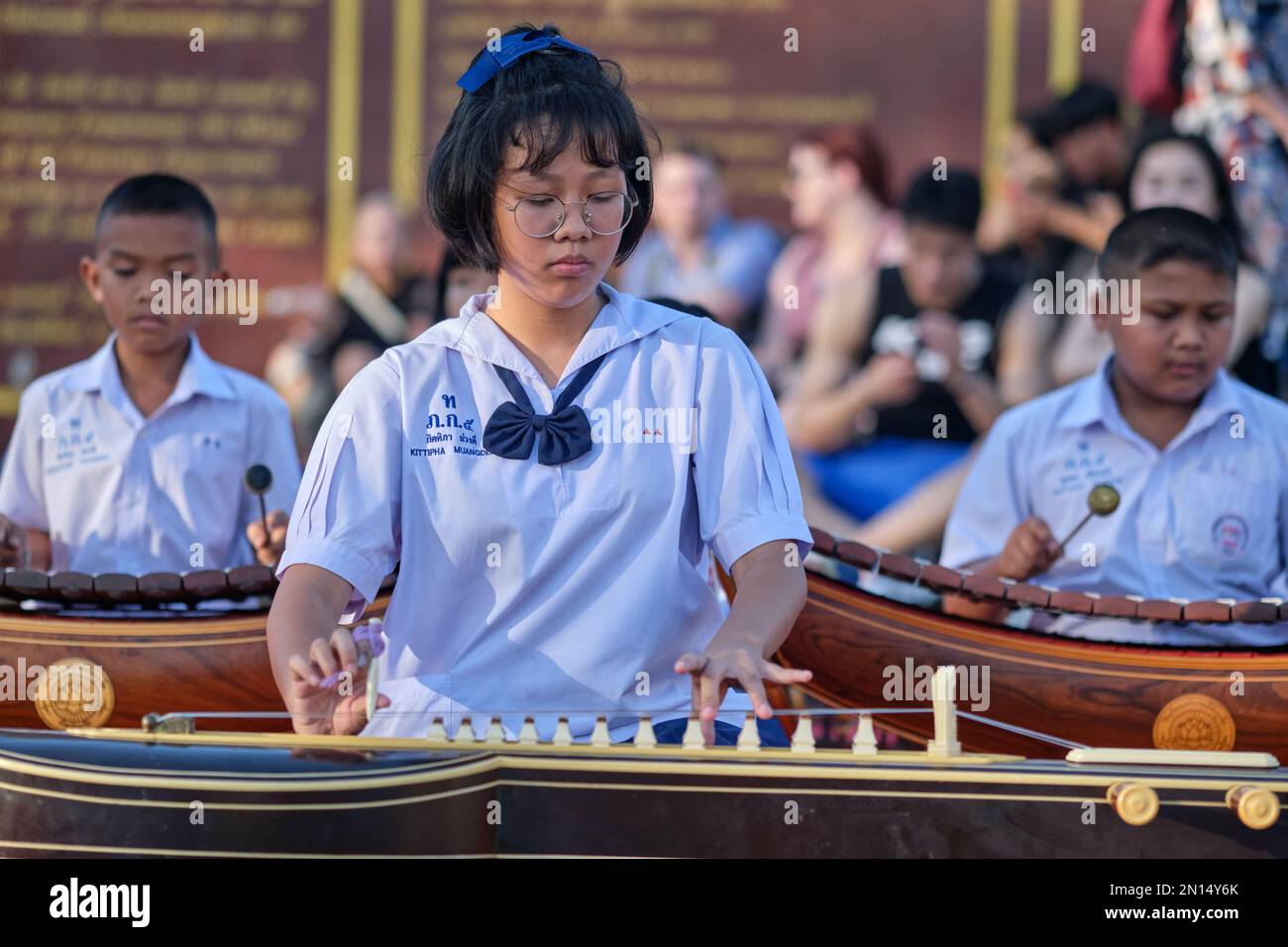 Thai school children during an opren-air performance of traditional ...