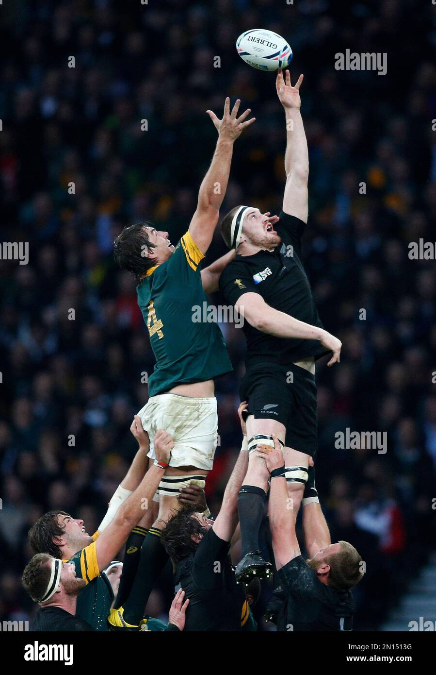 New Zealand's Brodie Retallick, right, wins a line out over South ...