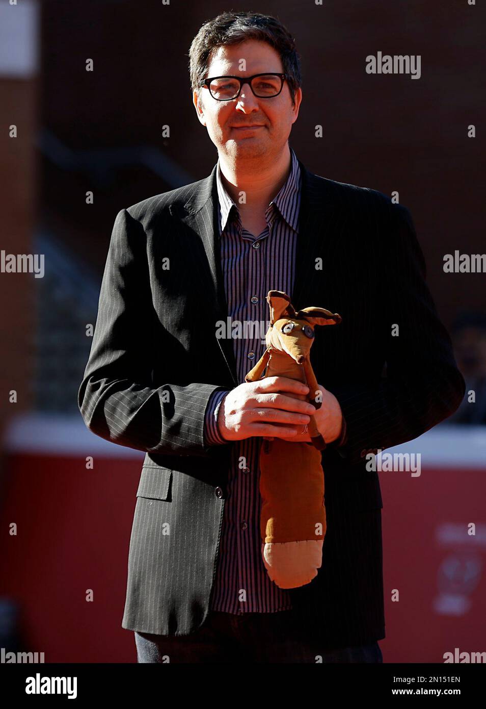 Director Mark Osborne poses for the photographers as he arrives on the ...