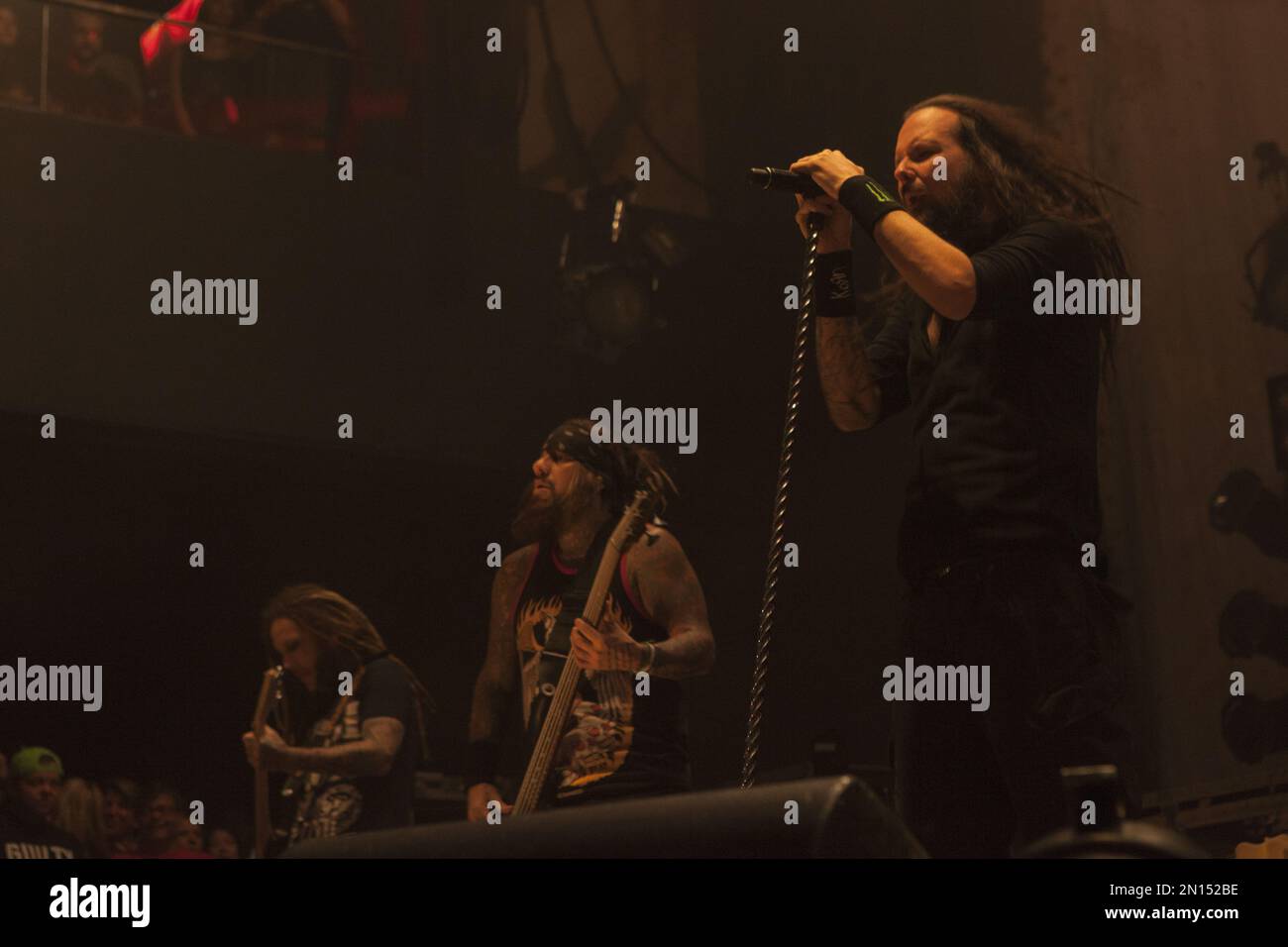 Left: Brian "Head" Welch Center: Reginald "Fieldy" Arvizuright Right ...