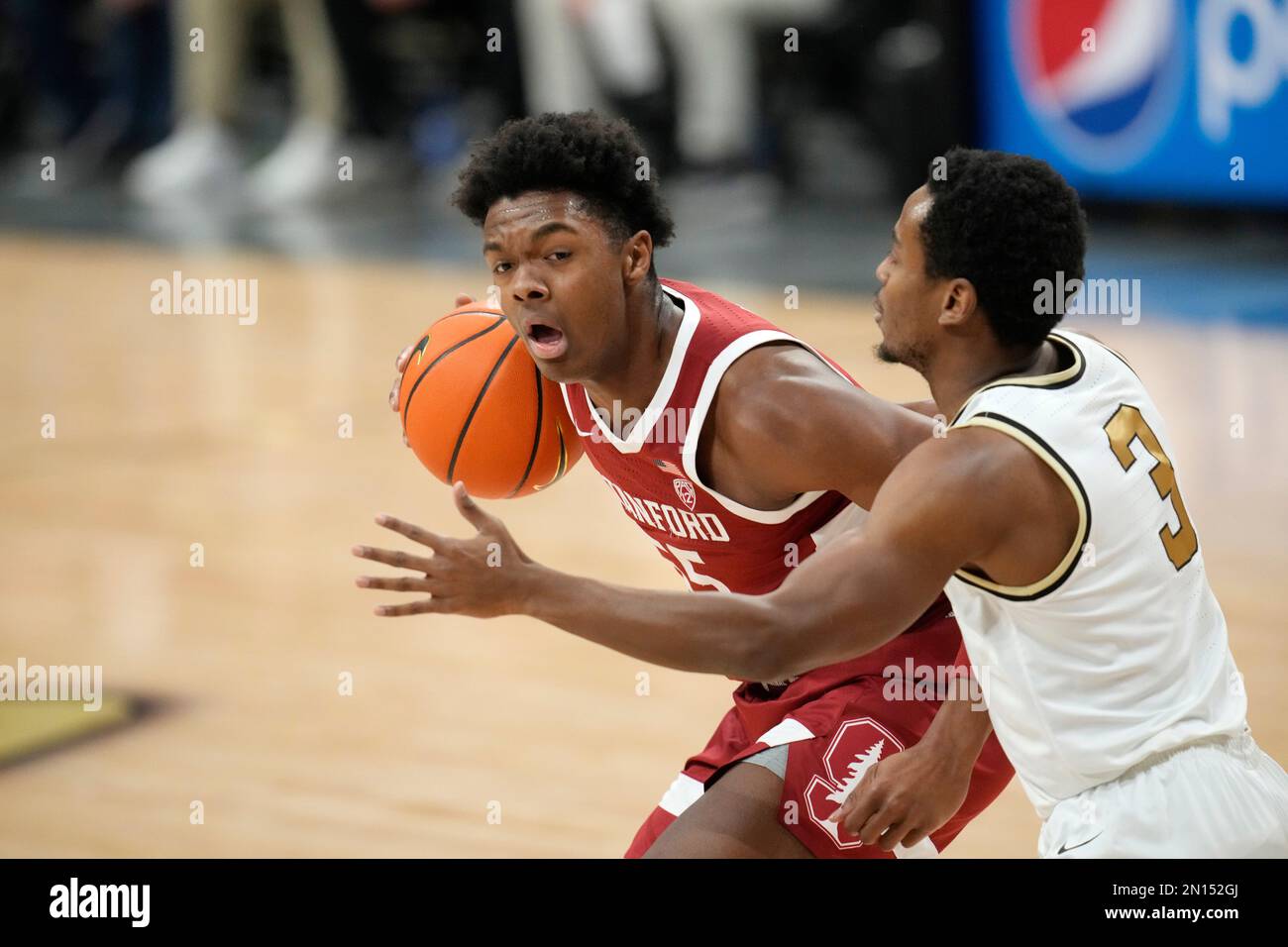 Stanford forward Harrison Ingram (55) and Colorado guard Jalen Gabbidon ...