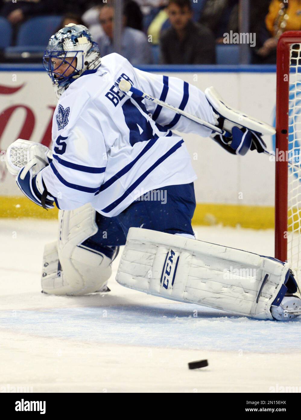 Toronto Maple Leafs goaltender Jonathan Bernier turns aside a shot ...