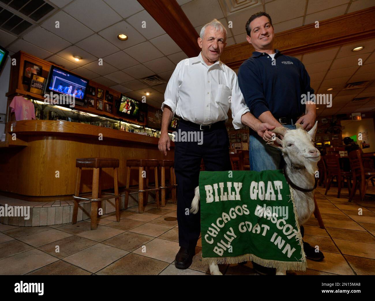 Billy Goat Tavern owners Sam Sianis, left, and his son Bill right, pose ...